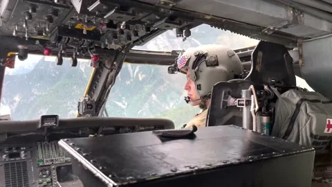 U.S. Air Force pilot flying HH-60 Pave H... | Stock Video | Pond5