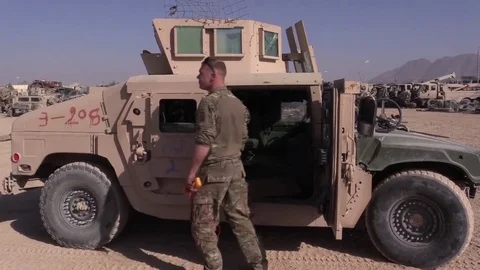 U.S. Army armored Humvee and soldier at ... | Stock Video | Pond5
