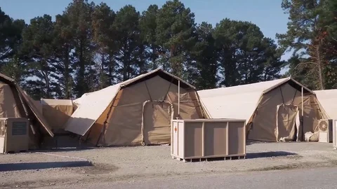 U.S. Army base camp in the woods | Stock Video | Pond5