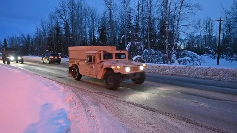 U.S. Army Humvee driving on icy road | Stock Video | Pond5