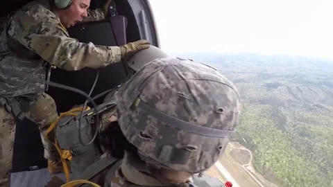 U.S. Army paratroopers jump from UH-60 B... | Stock Video | Pond5