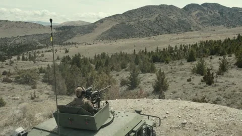 U.S. Army soldier fires M2 .50 machine g... | Stock Video | Pond5