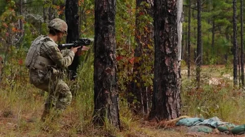 U.S. Army soldier running with weapon ra... | Stock Video | Pond5