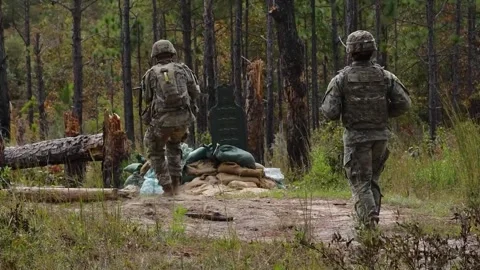 U.S. Army soldier running with weapon ra... | Stock Video | Pond5