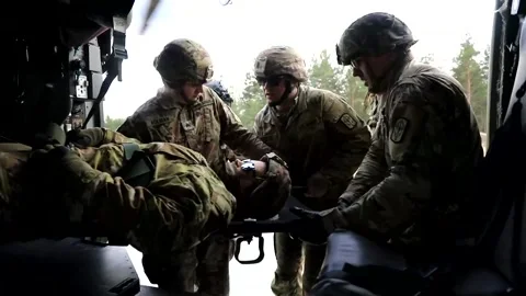 U.S. Army soldiers loading casualty on s... | Stock Video | Pond5