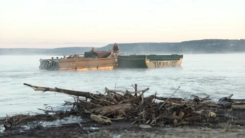 U.S. Army soldiers push floating bridge ... | Stock Video | Pond5