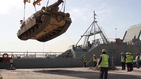 U.S. Army tank being lifted by crane for... | Stock Video | Pond5