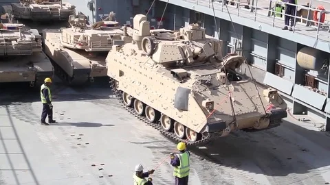 U.S. Army tank being lowered by crane on... | Stock Video | Pond5