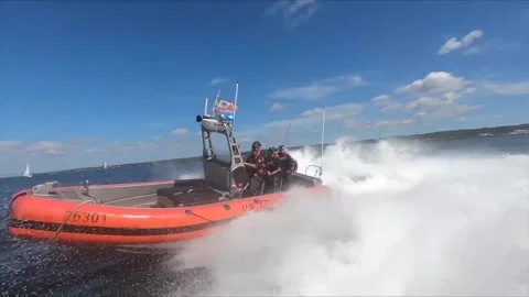 U.S. Coast Guard crew aim weapons from p... | Stock Video | Pond5
