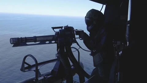 U.S. Marine fires the door gun from an A... | Stock Video | Pond5