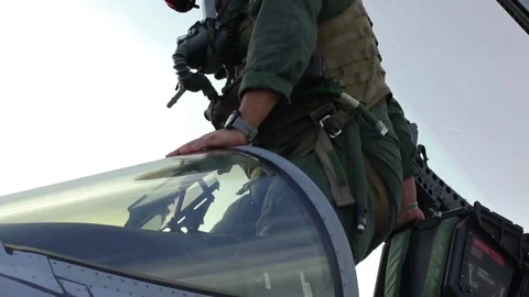 U.S. Marines pilot climbing into F/A-18 ... | Stock Video | Pond5