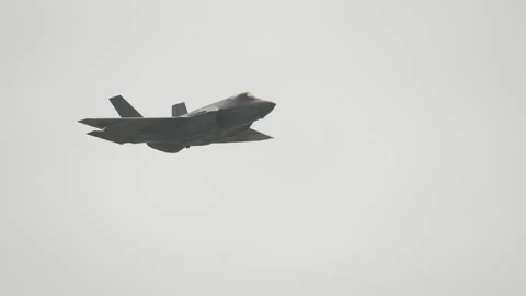 US military airplane fighter jet F35 fly... | Stock Video | Pond5