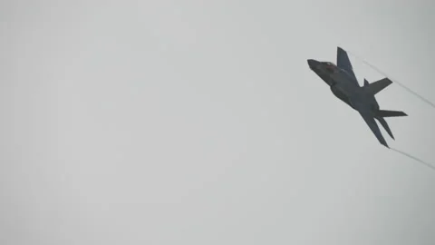 US military airplane fighter jet F35 fly... | Stock Video | Pond5