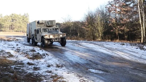 U.S. military Humvee jeep towing trailer... | Stock Video | Pond5