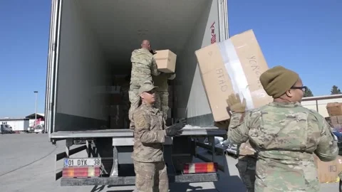 U.S. military personnel loading truck wi... | Stock Video | Pond5