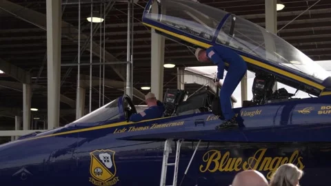 U.S. Navy Blue Angel pilot climbing down... | Stock Video | Pond5
