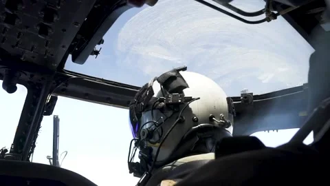 U.S. Navy pilot flying MH-60 Seahawk hel... | Stock Video | Pond5