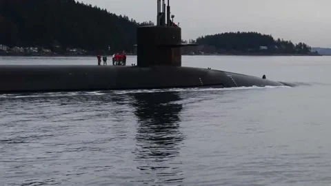 U.S. Navy sailors standing on hull of su... | Stock Video | Pond5