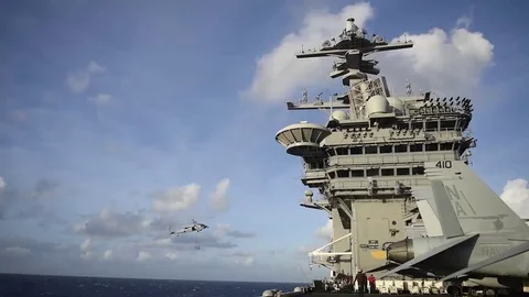 US Navy Seahawk delivers cargo to USS Th... | Stock Video | Pond5
