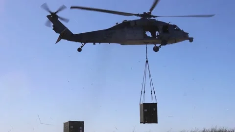 U.S. Navy Seahawk lifting cargo during s... | Stock Video | Pond5