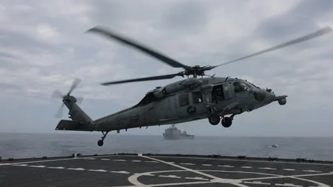 U.S. Navy SH-60 Seahawk helicopter landi... | Stock Video | Pond5