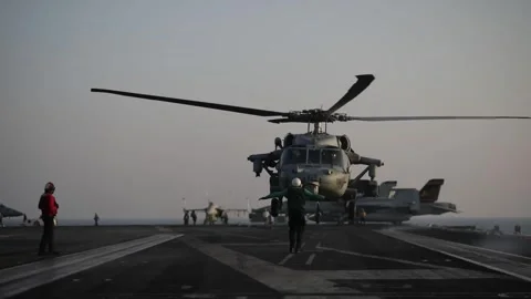 U.S. Navy SH-60 Seahawk landing aboard U... | Stock Video | Pond5