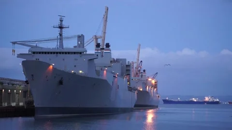 U.S Navy warship lighting up at night in... | Stock Video | Pond5