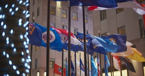U.S. State Flags blow in breeze in Rocke... | Stock Video | Pond5
