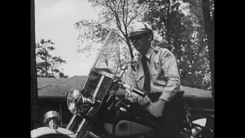 USA - 1959 - A motorcycle cop receives i... | Stock Video | Pond5