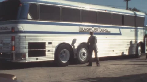 USA - 1983: Bus station worker checks ti... | Stock Video | Pond5