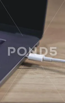 Photograph: USB Type C Port Cable for fast charging laptop. Close up ...