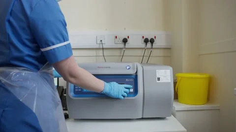 Using a Blood Sample Machine in a Labora... | Stock Video | Pond5