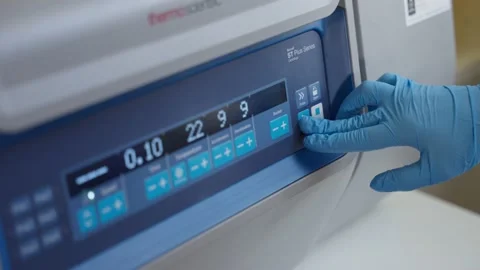 Using a Blood Sample Machine in a Labora... | Stock Video | Pond5