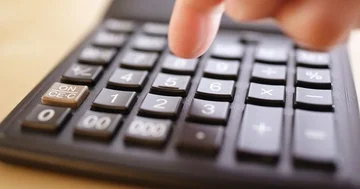 Using the calculator | Stock Video | Pond5