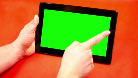 Using Green Screen Tablet on Red Backgro... | Stock Video | Pond5