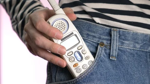 Using a Retro 90s Telephone Handheld Dev... | Stock Video | Pond5