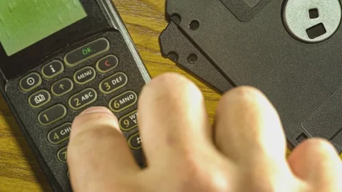 Using a retro cell phone button detail f... | Stock Video | Pond5
