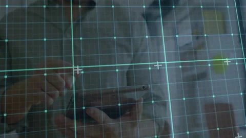Using tablet with digital grid overlay, ... | Stock Video | Pond5