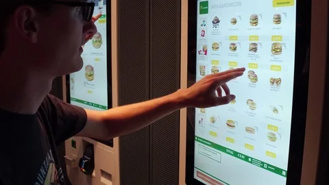 Using touch screen to order McDonalds in... | Stock Video | Pond5