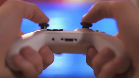 Using Video Games Controller with TV Scr... | Stock Video | Pond5