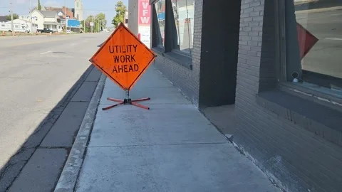 Utility Work Ahead Street Signage and Bu... | Stock Video | Pond5