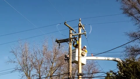 Utility Workers Moving Power Lines - 4K ... | Stock Video | Pond5