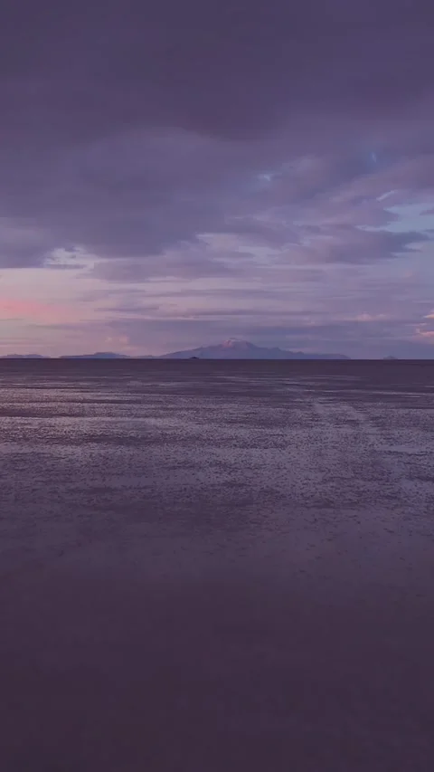 Uyuni Salt Flats and Reflection on Water... | Stock Video | Pond5
