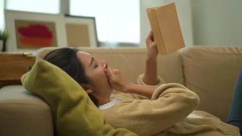 Vacation time of female reading and slee... | Stock Video | Pond5