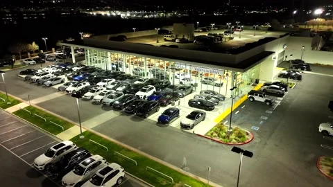 Valencia BMW luxury car dealership - nig... | Stock Video | Pond5