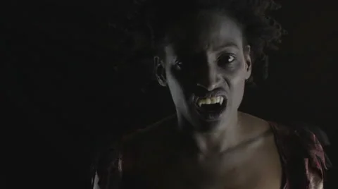 Female Vampire Bite Stock Footage ~ Royalty Free Stock Videos | Page 3