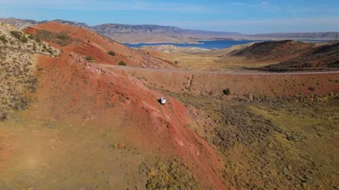 van in the distance climbing a 4x4 road ... | Stock Video | Pond5