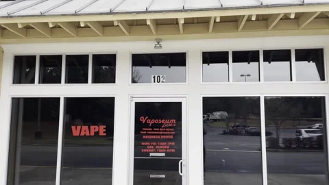 Vaposeum Vape smoke shop retail store in... | Stock Video | Pond5