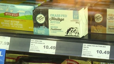 Various brands of butter with price tags... | Stock Video | Pond5