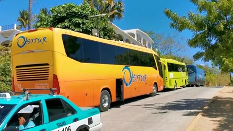 Various colorful buses tour bus transpor... | Stock Video | Pond5
